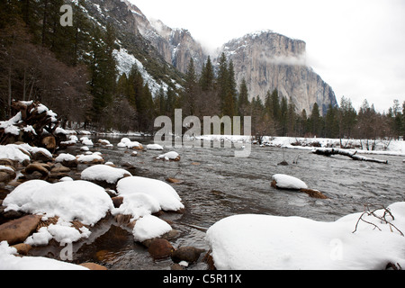Merced River during winter with snow, Yosemite National Park ...