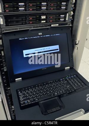 HP Proliant and Dell servers racked in computer server room cabinets ...