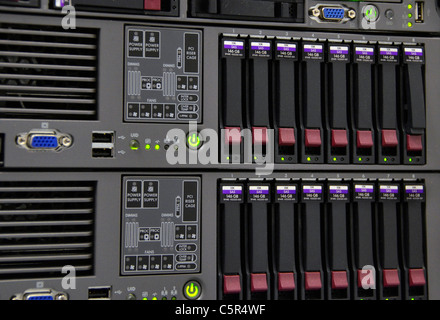 HP Proliant and Dell servers racked in computer server room cabinets ...