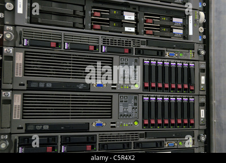 HP Proliant and Dell servers racked in computer server room cabinets ...