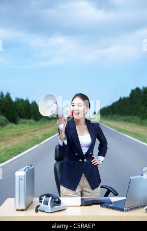 One way. Hand holding a megaphone. flat style Stock Photo - Alamy