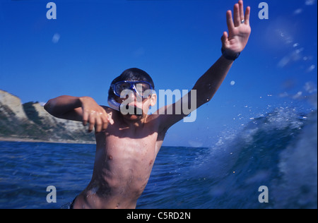 Corfu, Greece, Diving boy at Gardenos Beach Stock Photo - Alamy