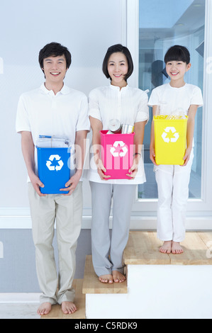 Father, Daughter Holding Recycle Bin Stock Photo - Alamy