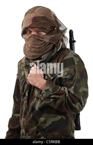 A hidden face of a guerrilla warrior with serious stare on eyes Stock ...