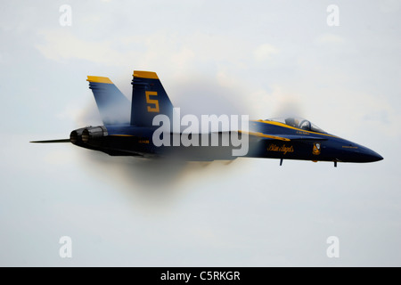 Blue Angels sneak pass with vapor cone Stock Photo - Alamy