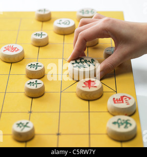 A hand on Korean chessboard Stock Photo - Alamy
