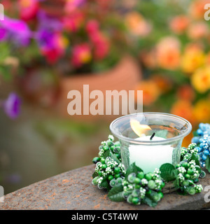Flower pot and candles Stock Photo - Alamy