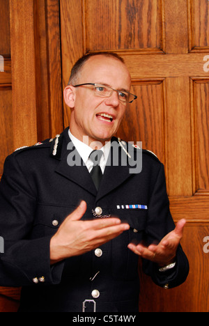 Former Surrey Police officer Mark Witcher (centre), 30, arrives with ...