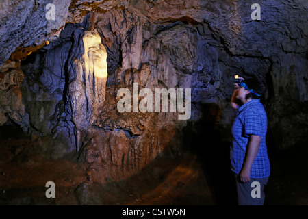 Greece, Crete, Lasithi Plateau, Tzermiado, Person sitting with ...