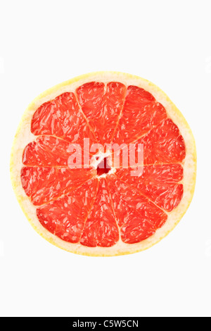 Cross section of grapefruit against white background Stock Photo - Alamy