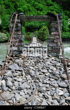 A hanging bridge over treacherous river. Sichuan, China Stock Photo - Alamy