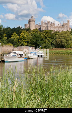 Arundel castle and the River Arun with moored boats. West Sussex ...