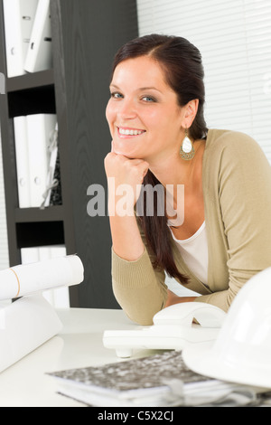 Office relaxation pose professional architect woman leaning over table ...