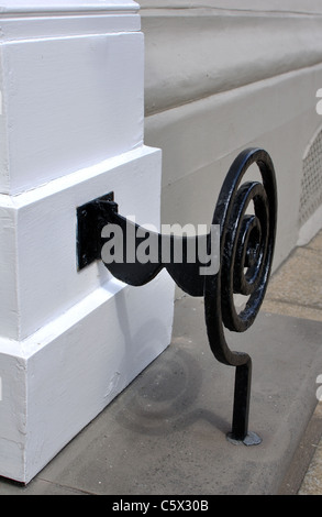 Boot scraper outside door Stock Photo - Alamy