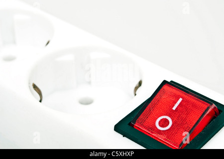 Isolated power outlet with button Stock Photo - Alamy
