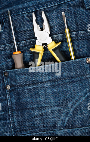 Back pocket of blue jeans with a white card isolated on white ...
