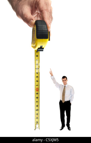Young man measuring his height with ruler Stock Photo: 19889501 - Alamy