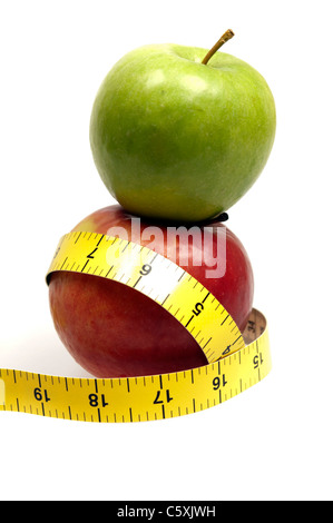 Apple and ruler are isolated on a white background Stock Photo - Alamy