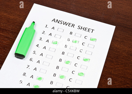 Answer sheet and green marker Stock Photo - Alamy