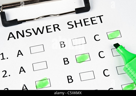 Answer sheet and green marker Stock Photo - Alamy