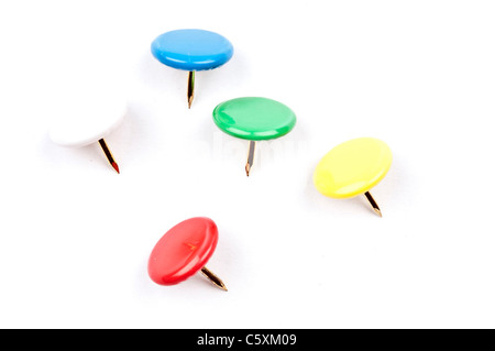 Pushpins on white background Stock Photo - Alamy