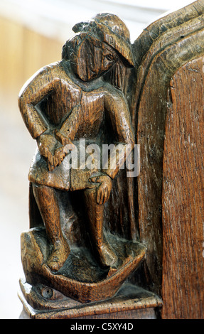 Medieval bench end, Anger, Seven Deadly Sins, angry man with knife in ...