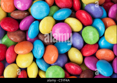 Round smarties. Round sugar coated candy dragee bubblegum texture. Food ...