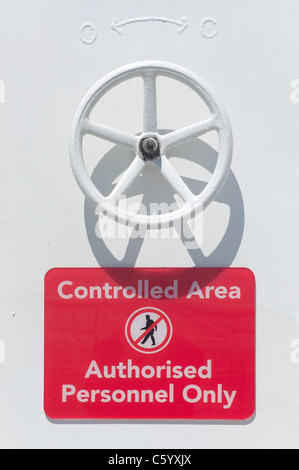 Security restricted area sign on the fence between the Runway Visitor ...