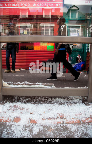 Looted and smashed up shop fronts along London Road in Croydon. The day ...