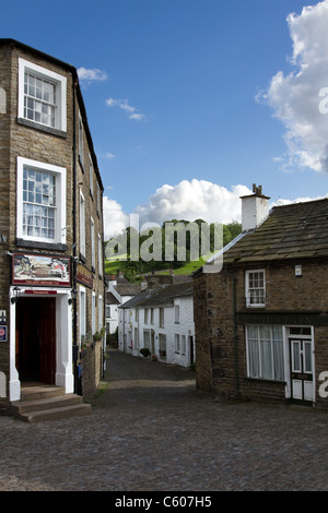 The narrow cobbled streets of the Cumbrian village of Dent in Dentdale ...
