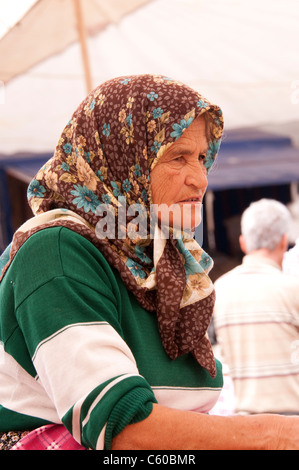 Elderly woman making Gözleme, a traditional Turkish food, Kalkan ...