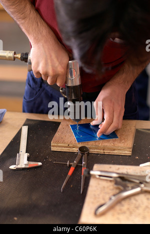High school Student using Drill Press Stock Photo - Alamy