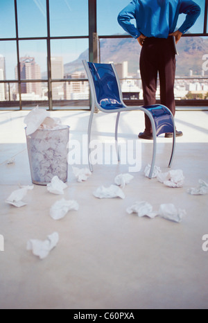 Man crumpling paper Stock Photo - Alamy