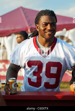 Washington Redskins running back Tim Hightower greets fans as he comes ...
