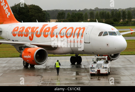 Ground support service using a pushback tractor to move an Easyjet ...