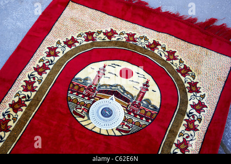muslim prayer mat with compass Stock Photo - Alamy