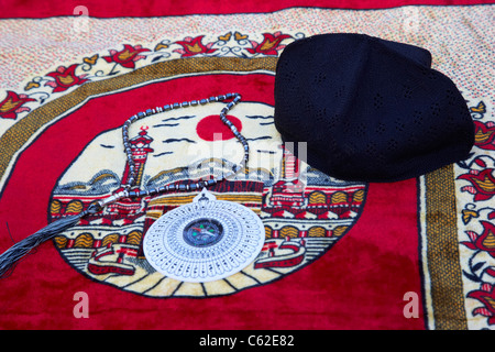 muslim prayer mat with compass Stock Photo - Alamy