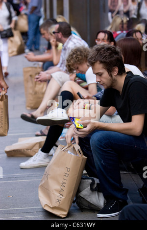 Primark shoppers gather outside the Oxford Street store in London ...