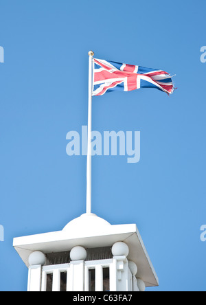 Union Jack Flag flying on a cloudy day in London, UK Stock Photo - Alamy