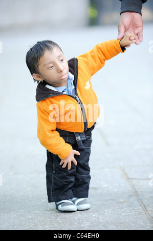Khagendra Thapa Mager, the shortest teenager in the world, poses for ...