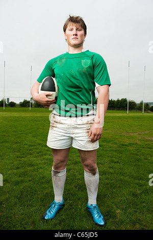 Rugby player in a white uniform scoring on a white background Stock ...