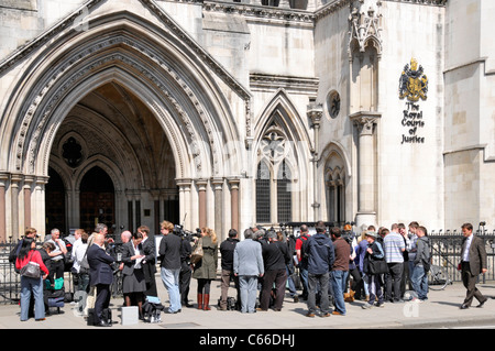 Crowd of media people including journalists reporters cameramen ...
