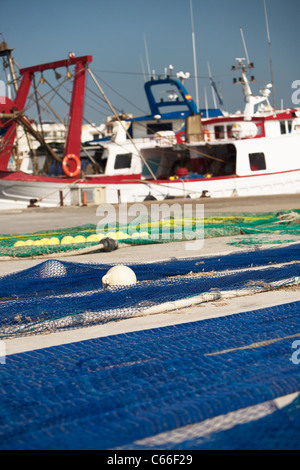 fishing net drying on a fishing boat Stock Photo - Alamy