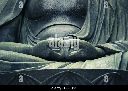 Detailed image of Buddha's sculpture hands in peaceful pose, focus on ...