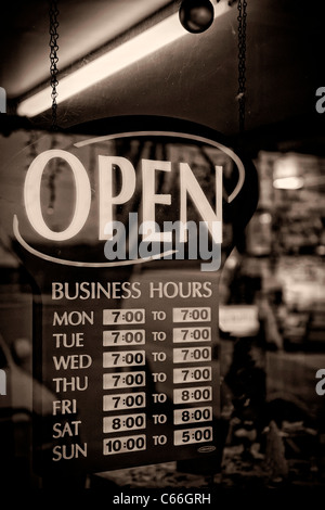 Open sign and business hours Stock Photo - Alamy