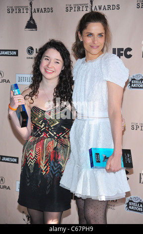 Amanda Peet and Sarah Steele. 2011 Film Independent Spirit Awards - Press Room held a the Santa ...