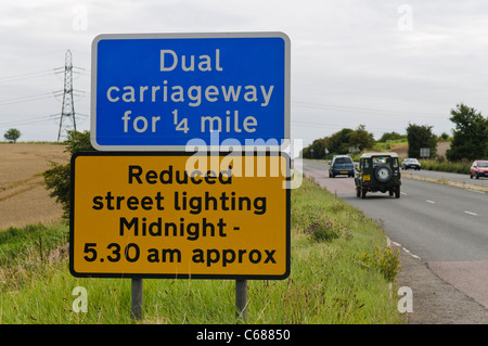 Road sign warning sign of dual carriageway ending speed reduction Stock ...