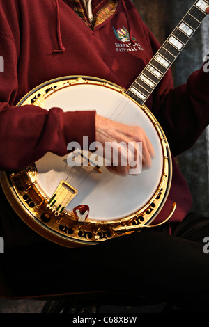 Close up detail of a Banjo being played Stock Photo - Alamy