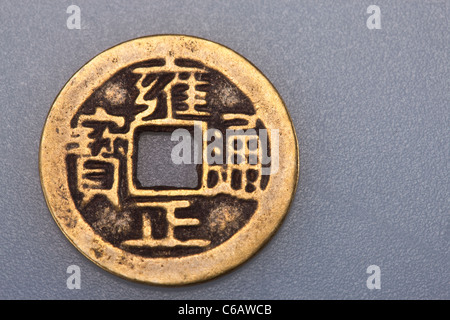 Most ancient Chinese copper coin with a hole. Isolated on white Stock ...
