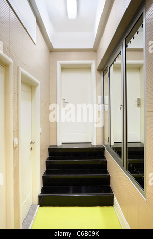 Empty home hall with walls and doors in white colors. Can be used as a ...